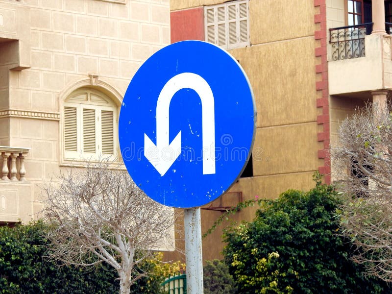 A Traffic Sign Indicates U-turn Ahead, Turning Back, Returning Symbol ...