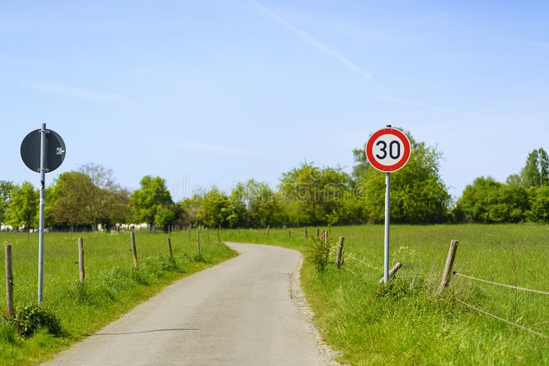 Traffic Sign Indicating Speed Limit in a Rural Landscape Stock Photo ...