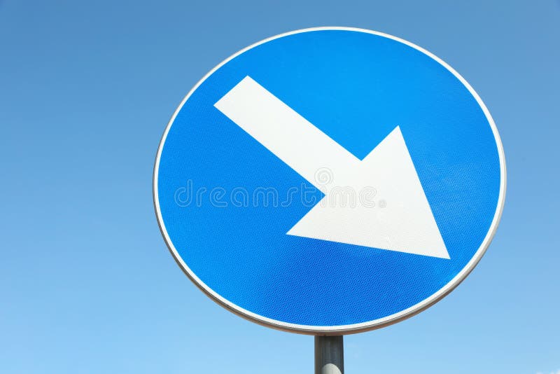 Traffic Sign Keep Right Against Blue Sky, Low Angle View Stock Photo ...