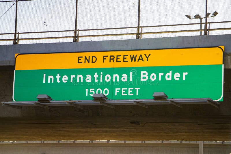 A Traffic Sign at Warning of an International Border Crossing Ahead ...