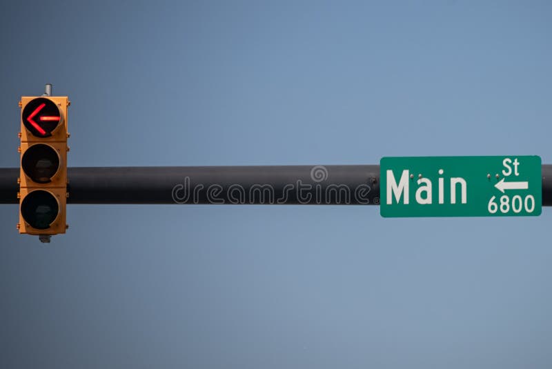 Main St. Sign and Traffic Light Stock Photo - Image of main, village ...