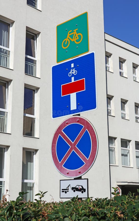 Traffic Signs in Front of a Building Stock Image - Image of road ...