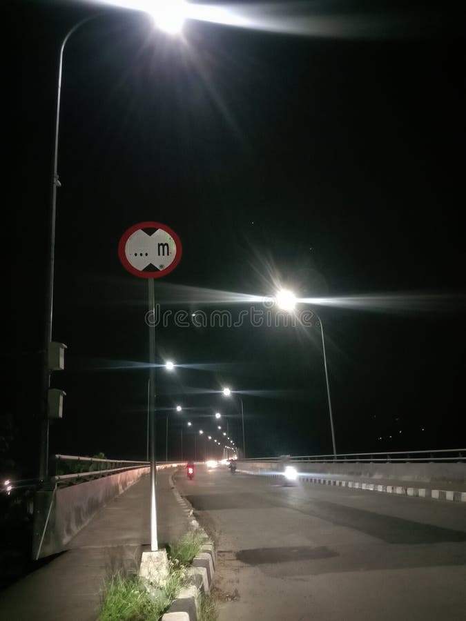 Traffic Signs and Lighting at Night Stock Image - Image of lamp, signs ...