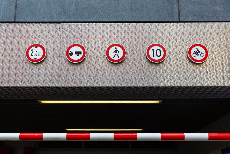 Traffic Signs Over a Garage Driveway Stock Image - Image of gateway ...