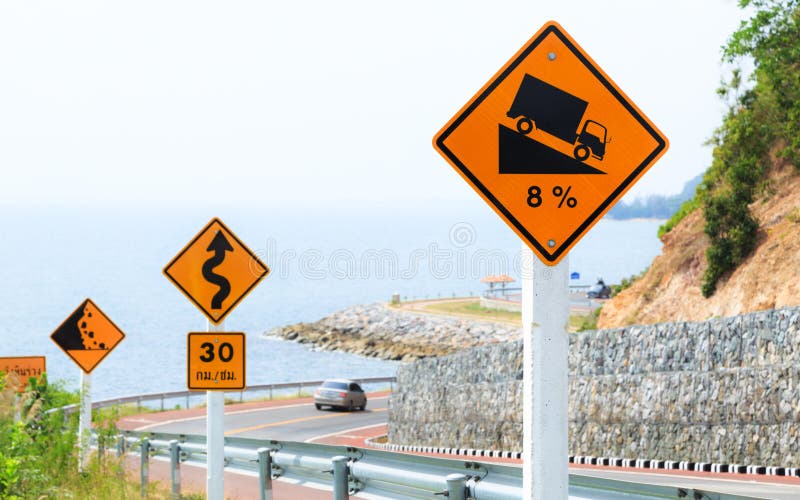 Traffic Signs of Steep Hill Descent Along the Beach Road Stock Image ...