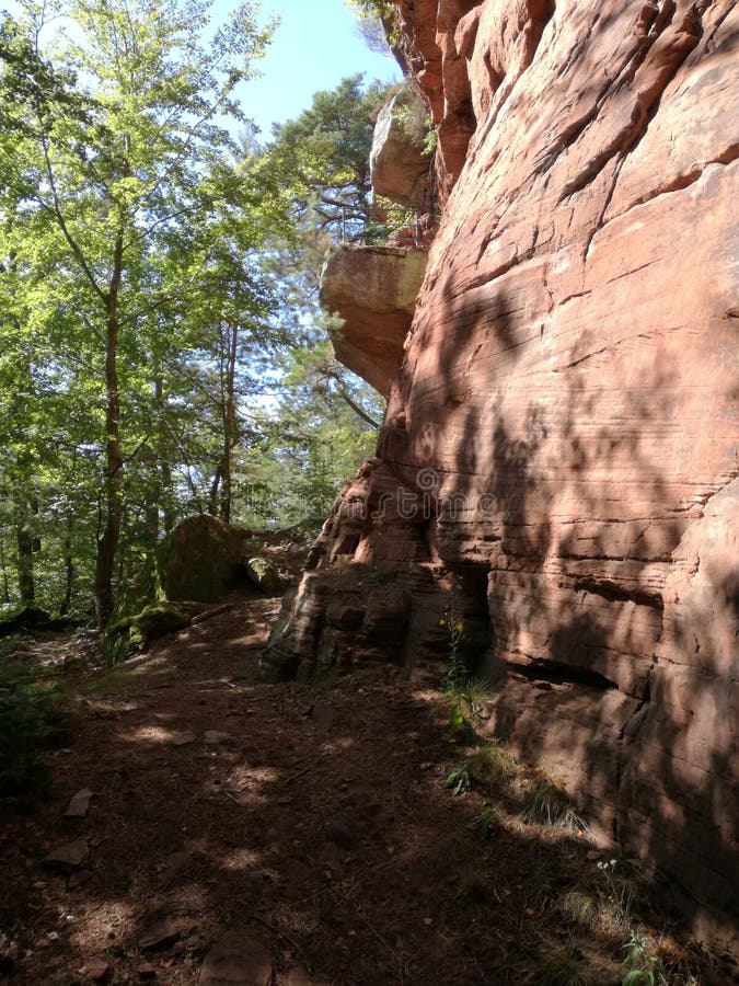 Trail Along a Large Red Rock Cliff Stock Image - Image of walkway ...
