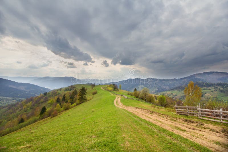 Trail in the Countryside and Mountains in the Background Stock Photo ...