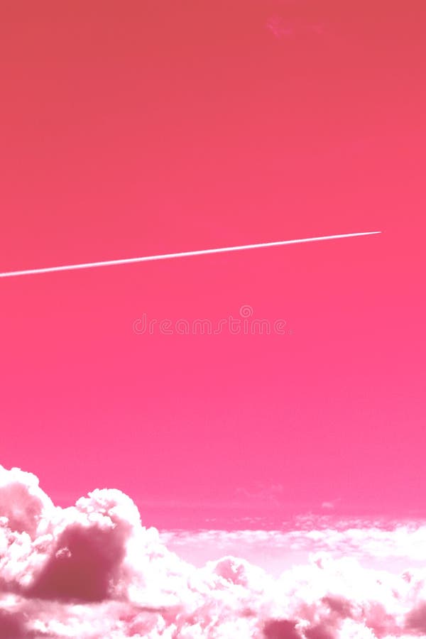 The Trail of a Flying Airplane in a Clear Pink Sky Stock Image - Image ...