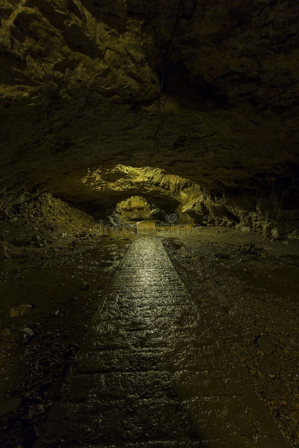 Path To Cave Exit stock photo. Image of cave, rock, green - 71990956