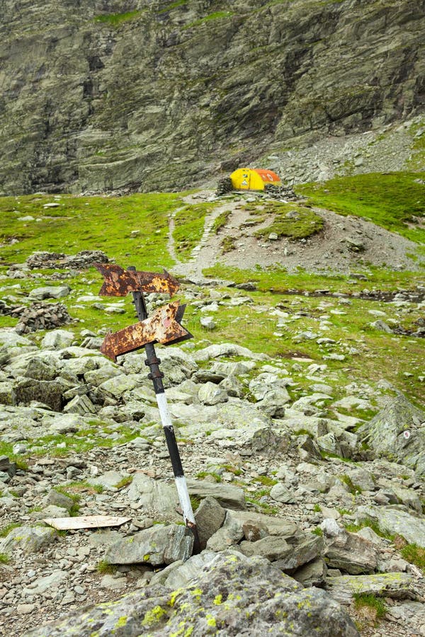 Red Trail Indicator Arrow Sign on a Wooden Pole Stock Photo - Image of ...