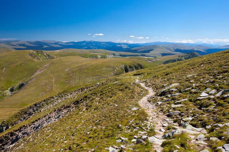 Trail in the mountains stock image. Image of tourism - 26080103