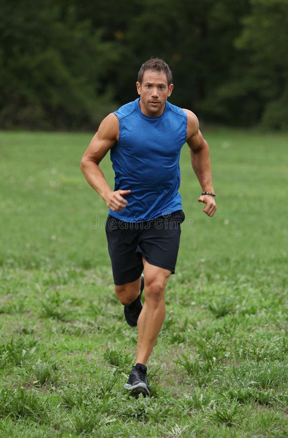 Running Man Runner Looking at Camera Smiling Stock Image - Image of ...