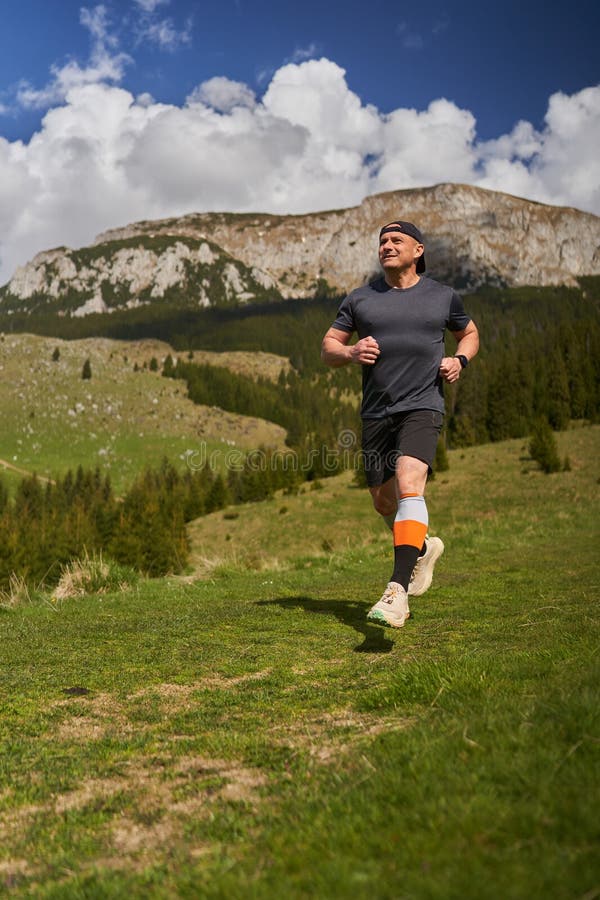 Trail runner man in a race stock image. Image of highlands - 317324677