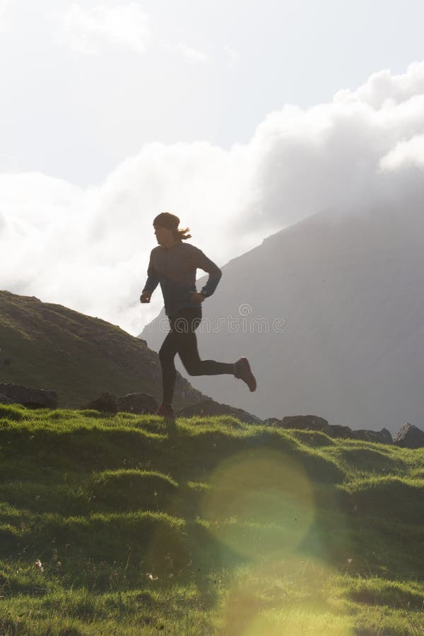 Trail Runner Running at Faroe Islands Editorial Photo - Image of rocks ...