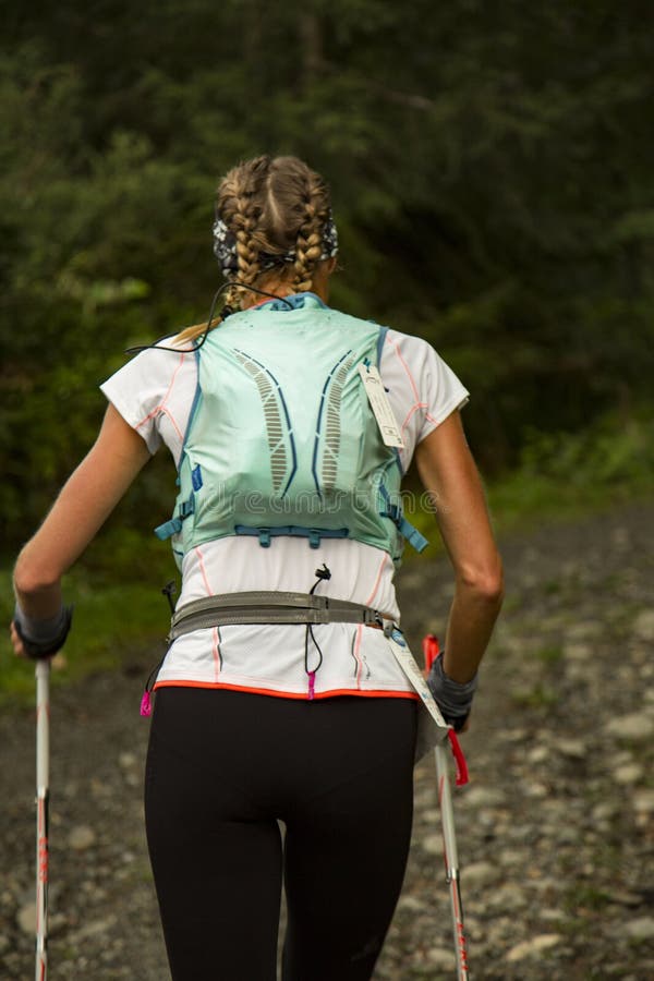 Trail runner woman editorial photo. Image of action - 100900896