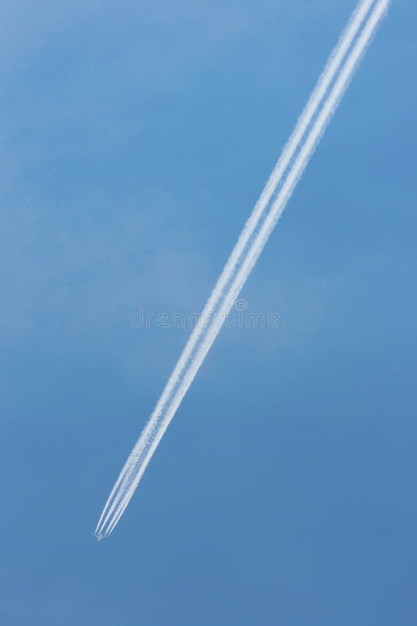 Trail of Vapor of a Commercial Plane Stock Image - Image of clear ...