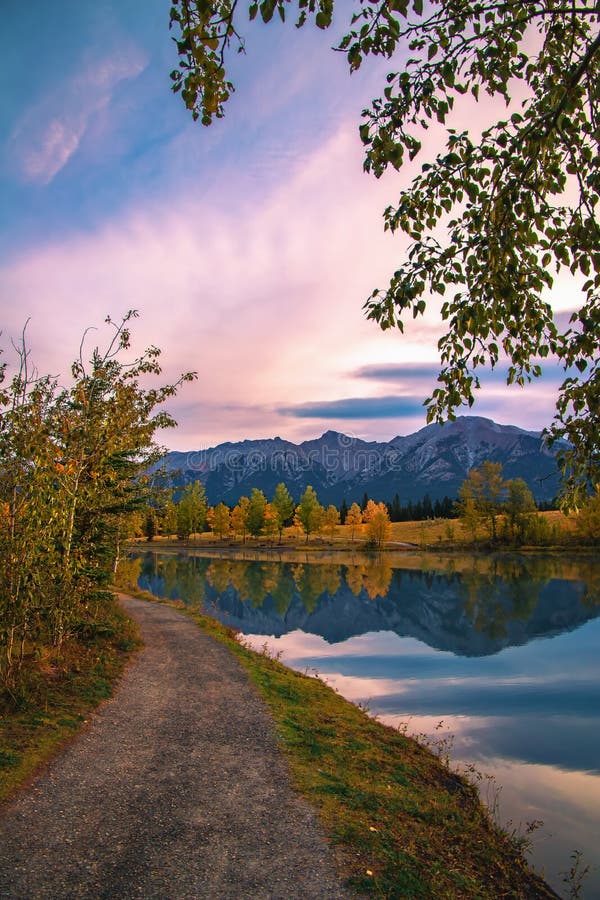 Trail by the Water in the Fall Stock Photo - Image of cloudy ...