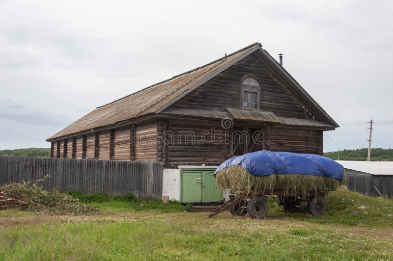 Trailer with Hay in Front of Barnyard Stock Photo - Image of barn ...