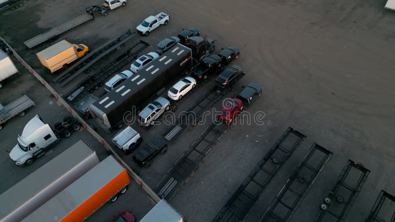 Trailer Semi Truck Driver Exiting Truck Stop Parking Lot. Aerial Drone ... Trailer Semi Truck Driver Exiting Truck Stop Parking Lot. Aerial Drone ...