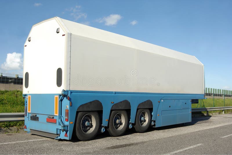 Semi Truck Sitting at a Loading Dock Stock Photo - Image of shipping ...