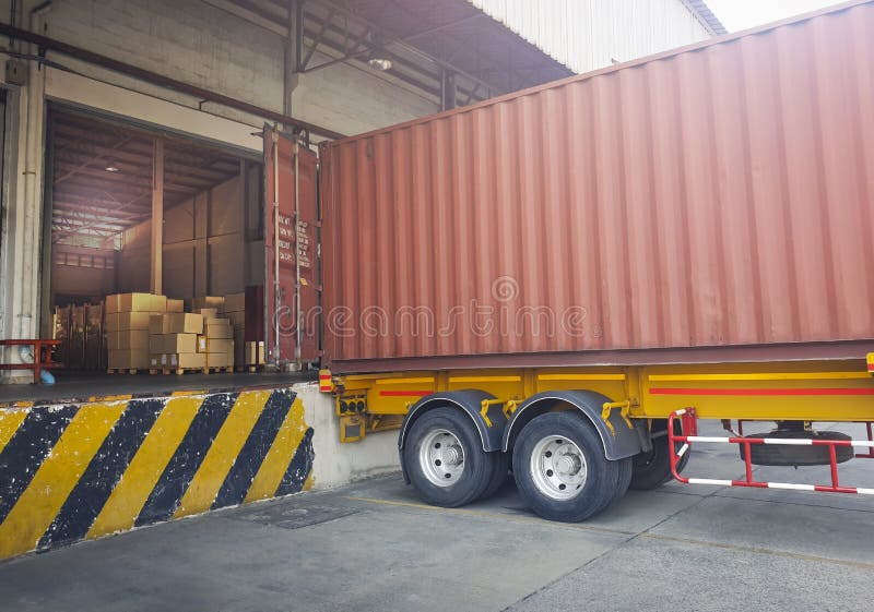 Trailer Trucks with Cargo Container Loading at Dock Warehouse. Shipment ...