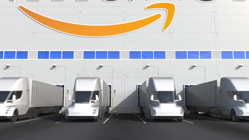Electric Semi-trailer Trucks at Warehouse Loading Bay with AMAZON Logo ...