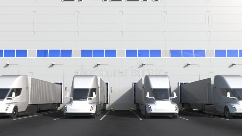 Electric Trailer Trucks at Warehouse Loading Bay with SPACEX Logo on ...