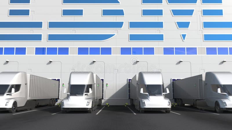 Modern Semi-trailer Trucks at Warehouse Loading Bay with INTEL Logo on ...