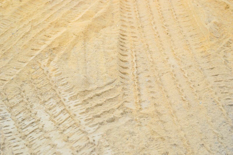 Trails of Wheel of Cars and Trucks on Sand, Background Stock Photo ...