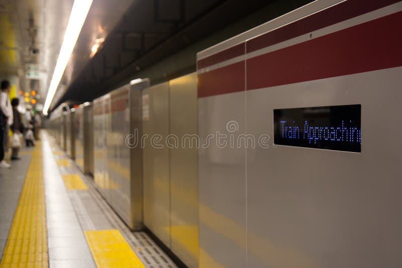 Train approaching barrier stock image. Image of safety - 25229441