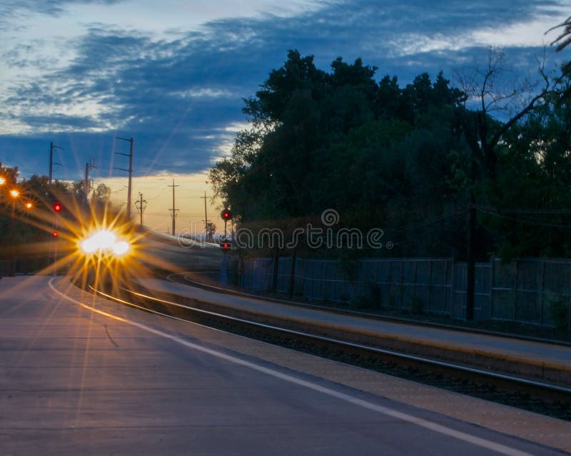 The train is approaching stock photo. Image of station - 84830094