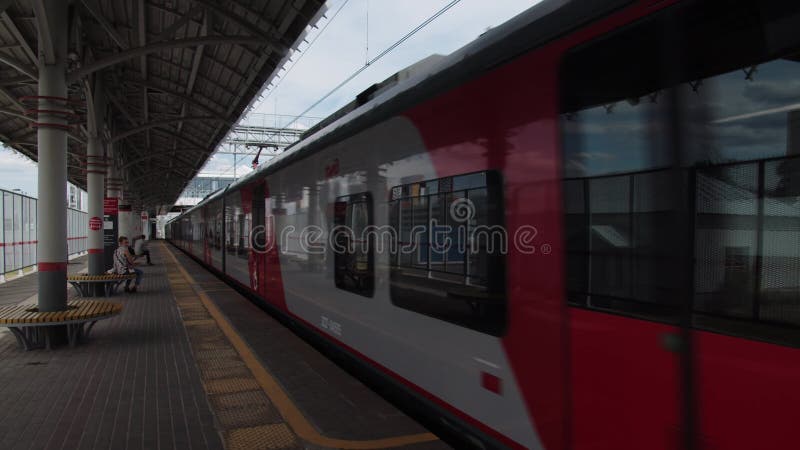 Train Arrival. a New High-speed Train Arrives on the Platform, Which ...