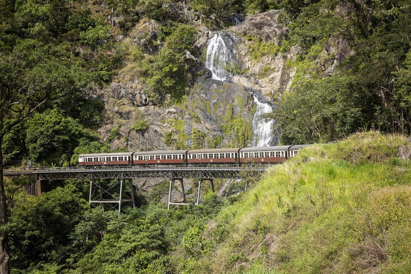 Train on a Bridge Against a Waterfall Stock Photo - Image of travel ...