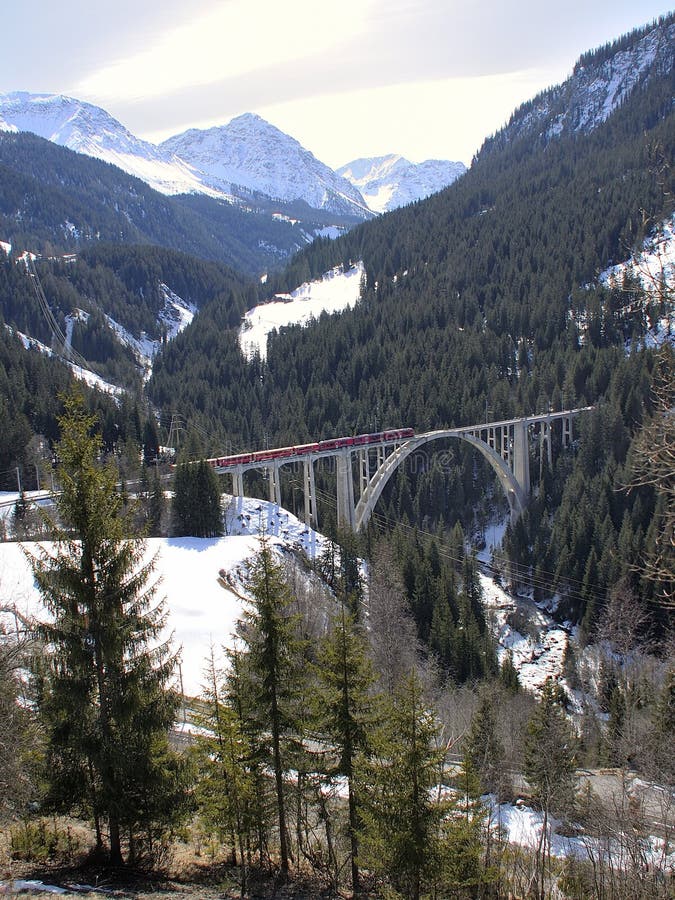 Train and Bridge stock image. Image of winter, blue, alps - 89223169