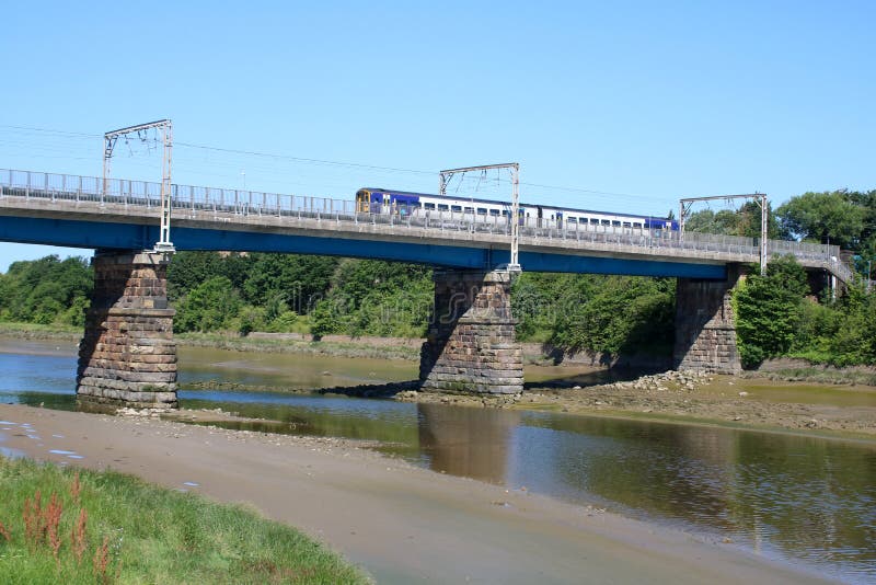 Train on Carlisle Bridge, River Lune, Lancaster Editorial Stock Photo ...