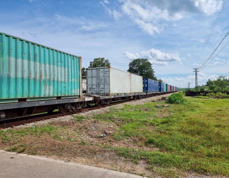 The Train is Carrying Containers. Diesel Engine Train of Thailand Stock ...
