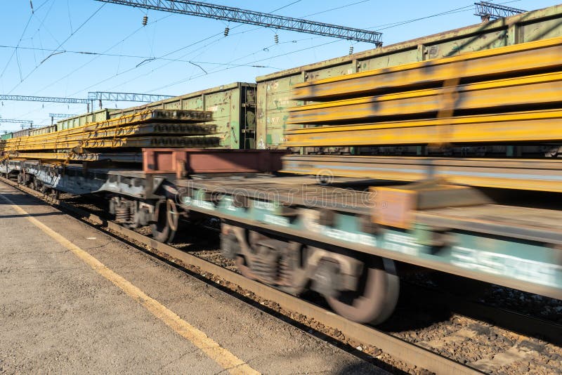 A Train Carrying Rails Arrives at the Station Stock Image - Image of ...