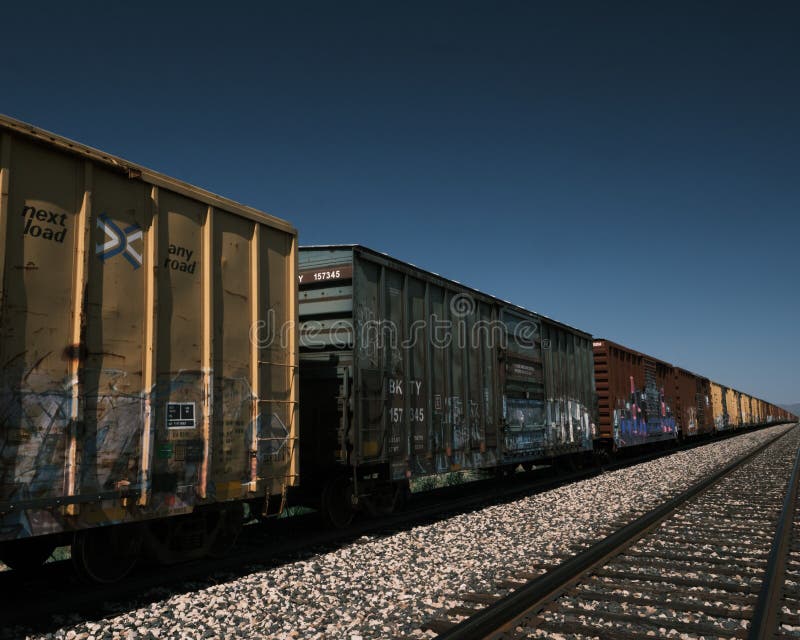 Train Cars Covered in Graffiti on the Tracks in West Texas Editorial ...