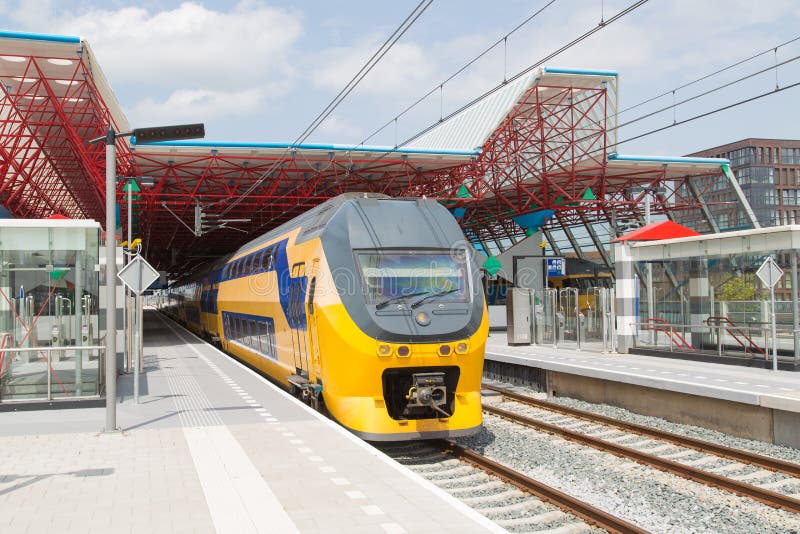 Train at the Central Station of a Dutch City Stock Photo - Image of ...