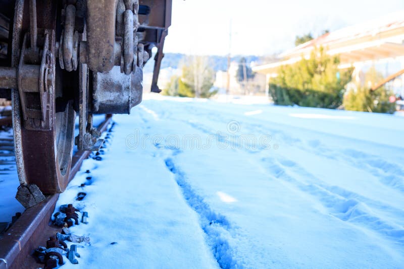Train Closeup on Snowy Railroad Tracks Stock Photo - Image of track ...