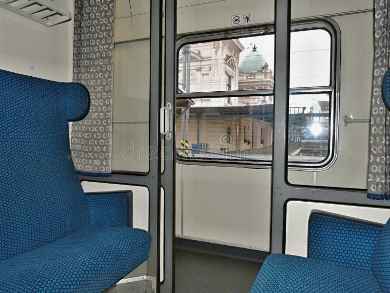 Train Compartment in Blue at the Station Stock Photo - Image of ...