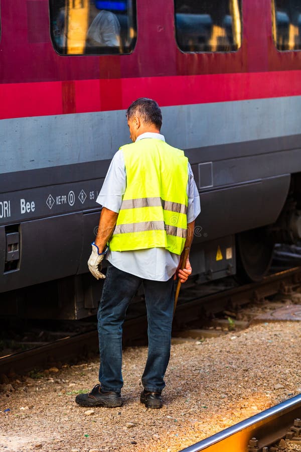 Train Crew Man Doing Checkings on the Platform at the Bucharest North ...