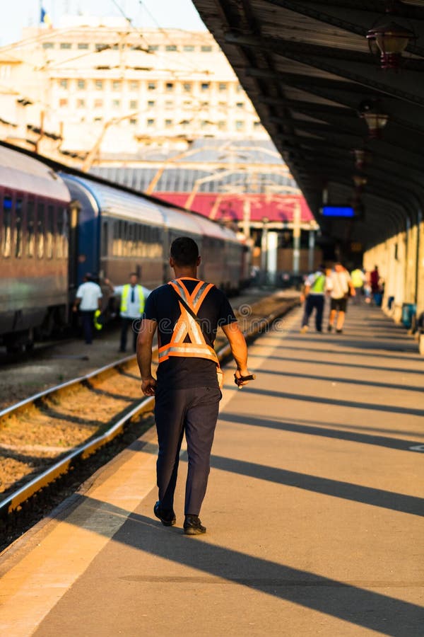 Train Crew Man Doing Checkings on the Platform at the Bucharest North ...