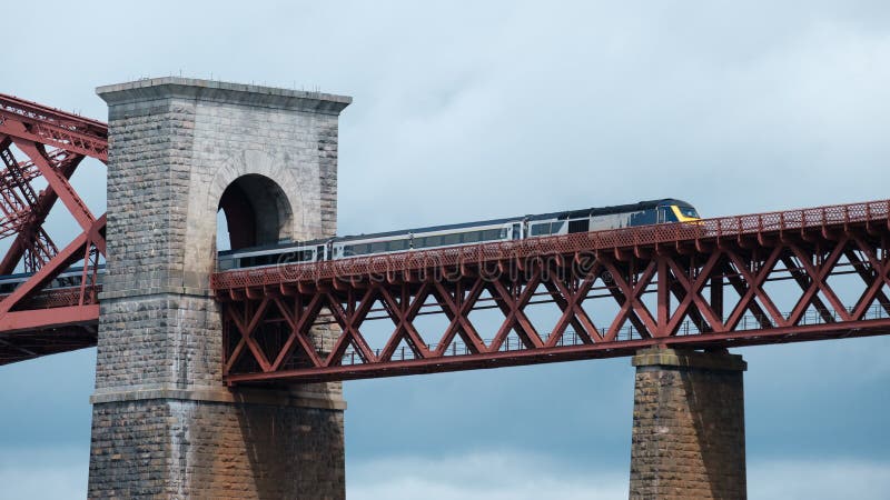 Train Crossing Forth Rail Bridge in Scotland Stock Photo - Image of ...