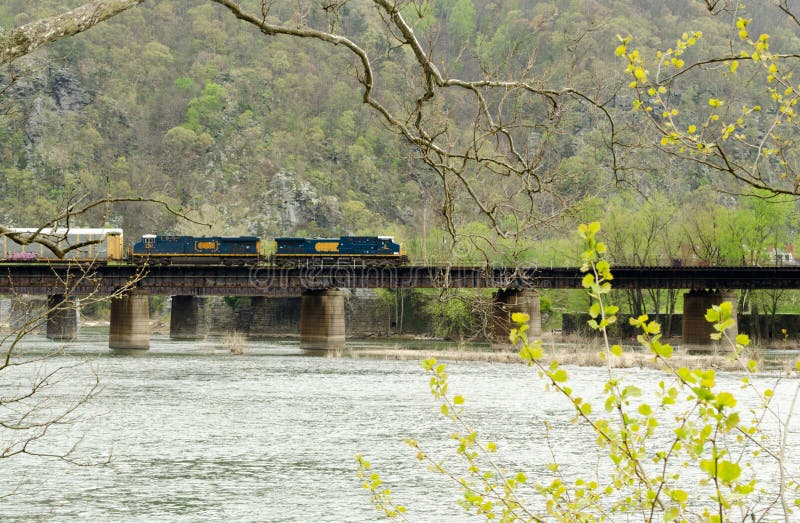 Train Crossing River Bridge Editorial Photography - Image of traincar ...
