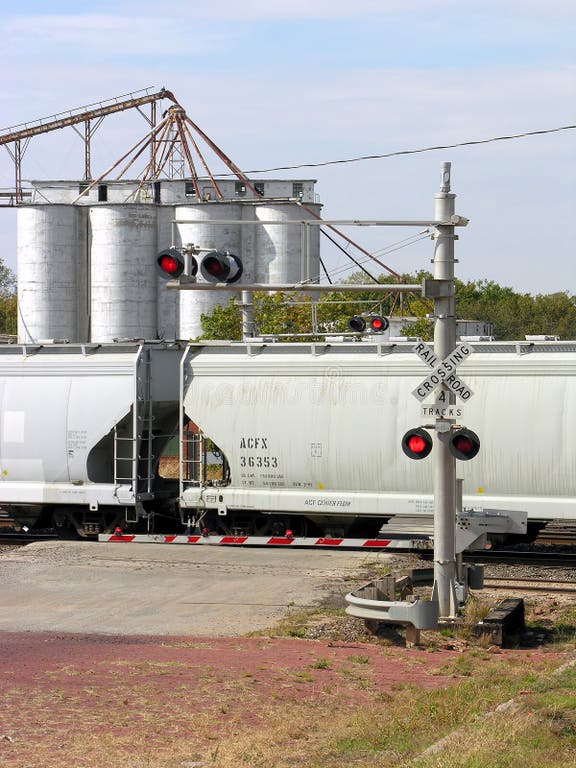 Train Crossing with Silos stock photo. Image of transportation - 312136