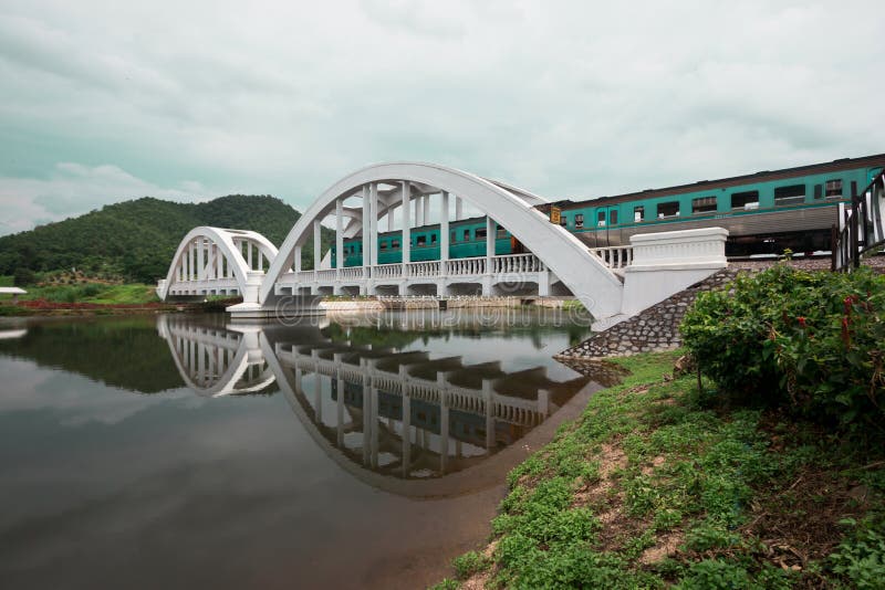 The Train is Crossing the White Bridge Stock Image - Image of shadow ...
