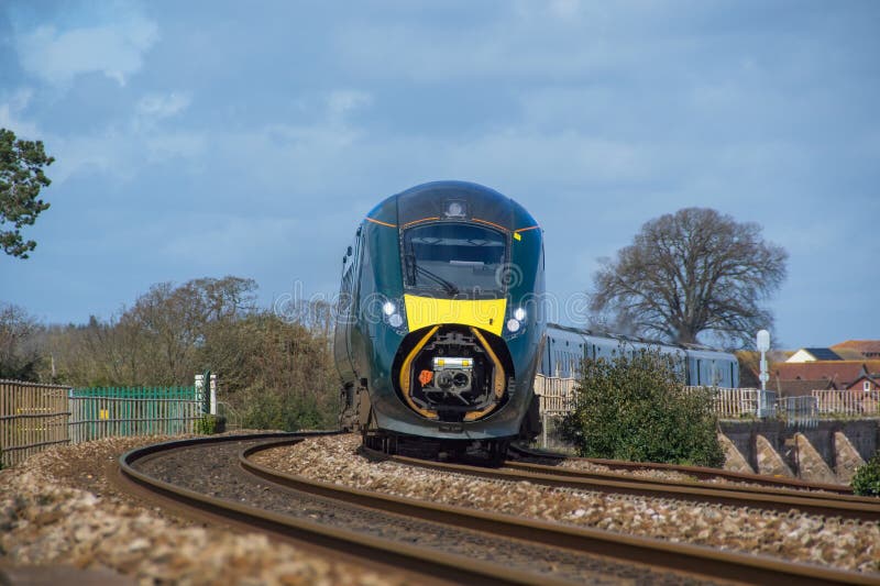 A Train on a Curving Track. Transport and Railway Infrastructure Stock ...