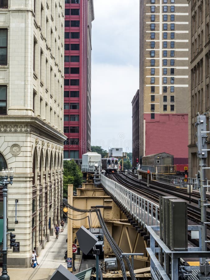 Train on Elevated Tracks within Buildings at the Loop, Glass and Steel ...