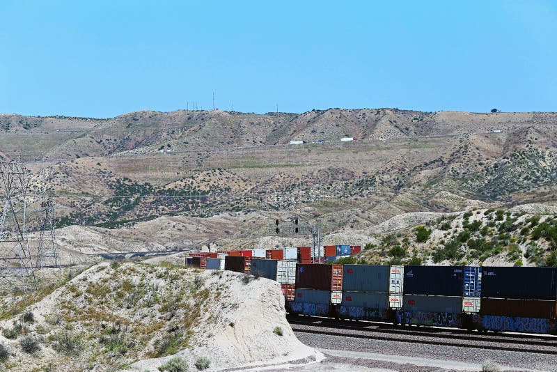 Train Going Through The Mountains Editorial Photography - Image of ...